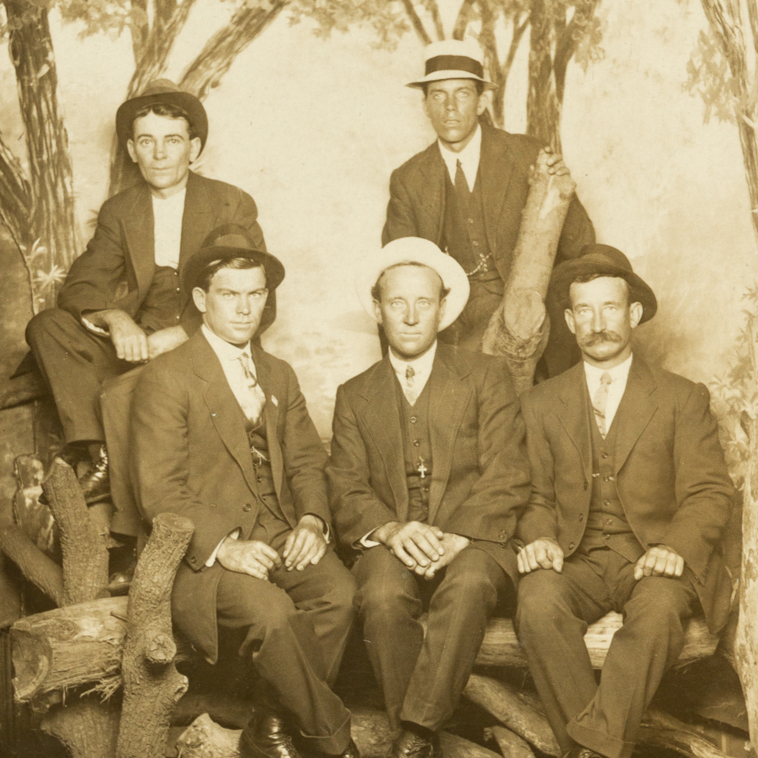 Studio portrait of five men in a staged bush setting. Melbourne, circa ...